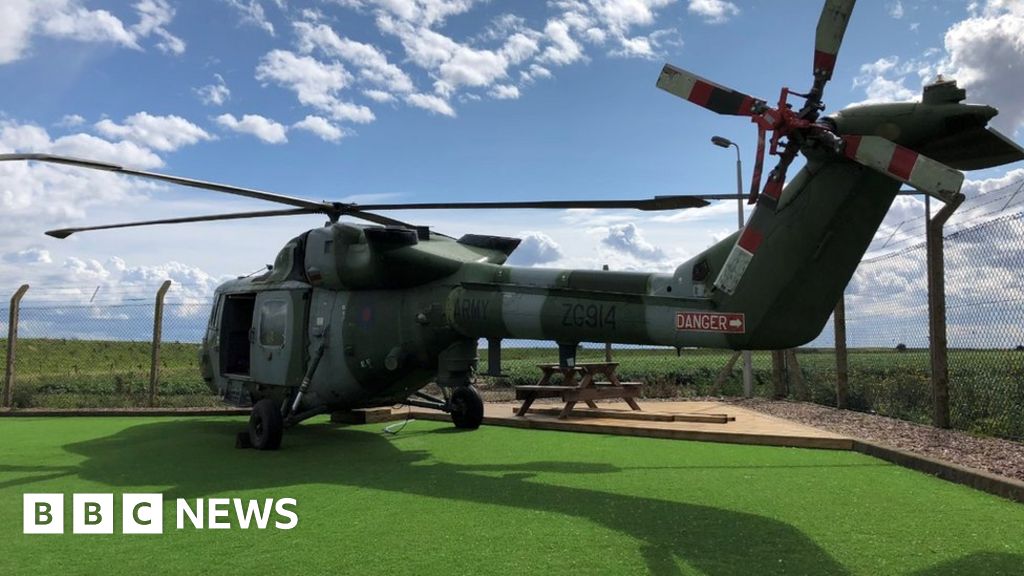 Helicopter converted into holiday pad at ex RAF bombing site - BBC News