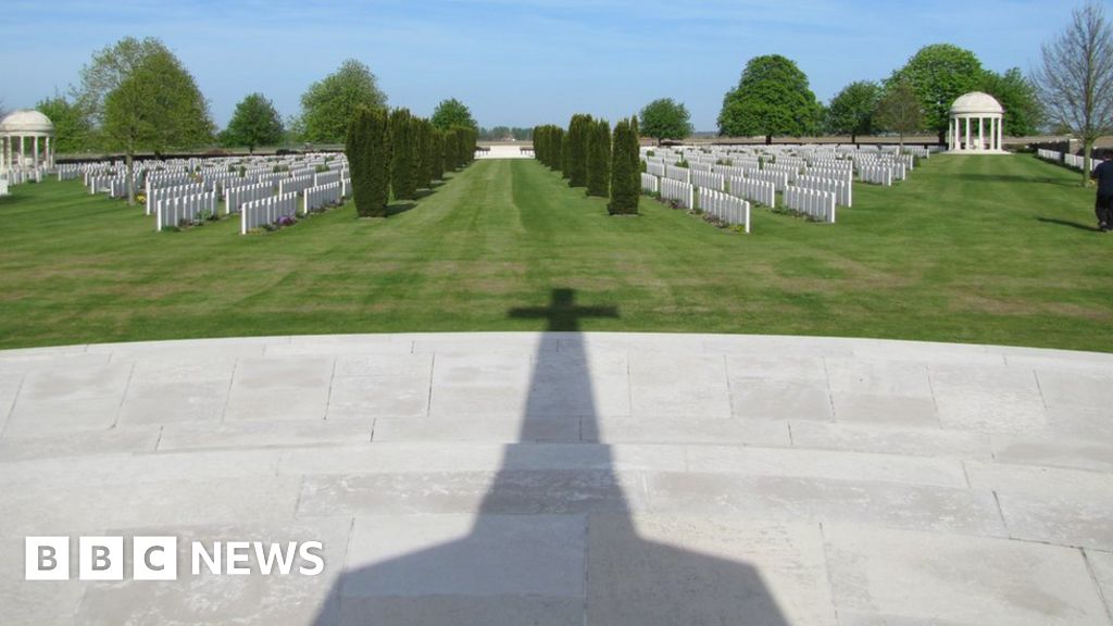 War graves photographer gets award from prime minister
