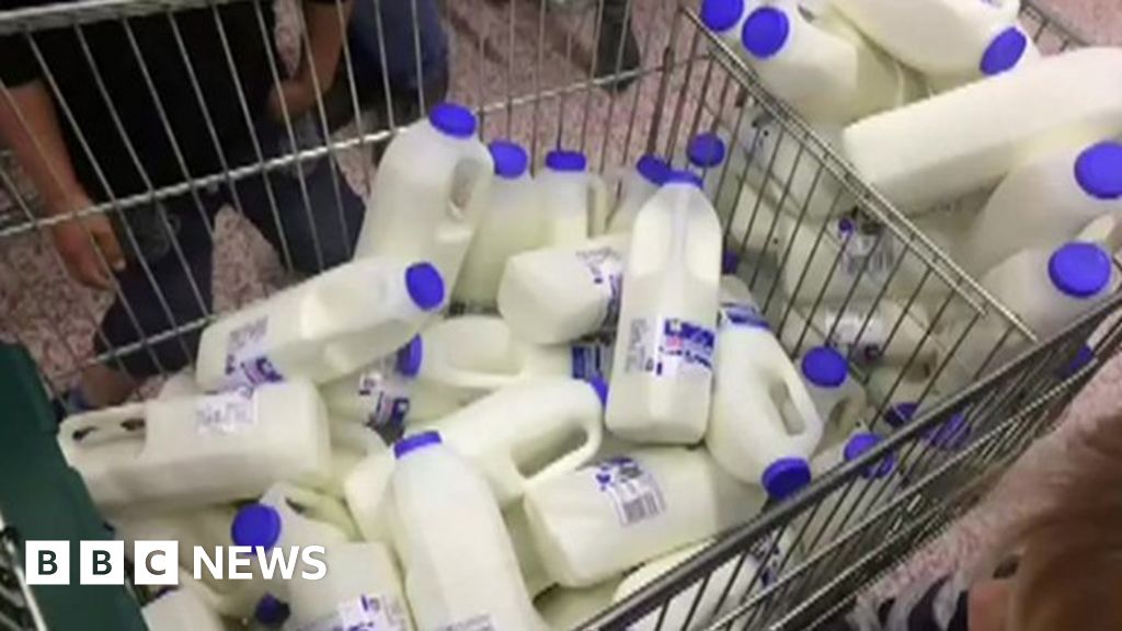 Milk protest at Morrisons sees farmers clear shelves - BBC News