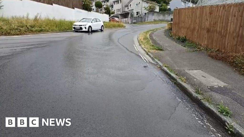 Leak to be fixed after water 'gushes' down road in Plymouth - BBC News