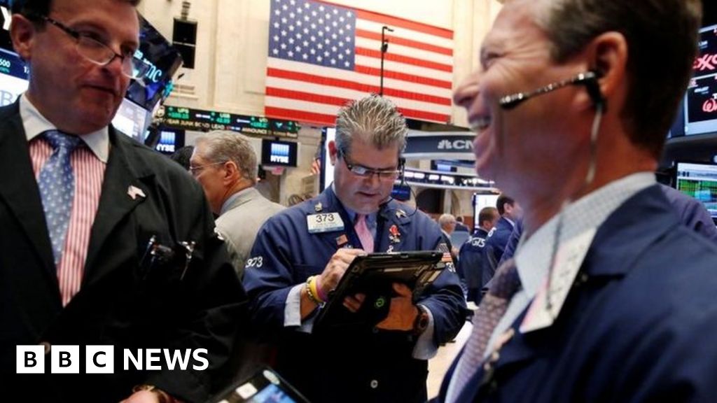 Dow, S&P and Nasdaq all hit new record highs - BBC News