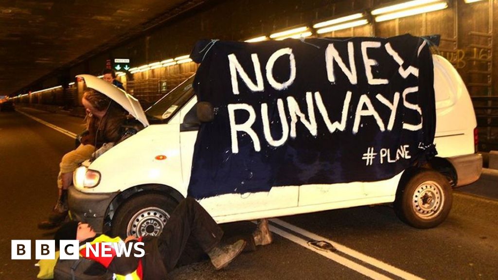 Heathrow protesters arrested after blocking tunnel - BBC News
