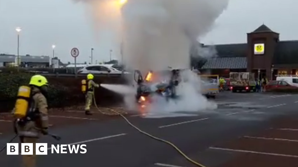 Van catches fire in Dumfries superstore car park - BBC News