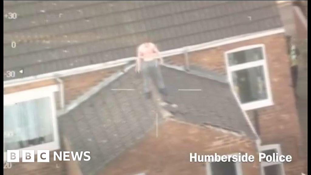 Attacker's rooftop stand-off footage released by Humberside Police ...