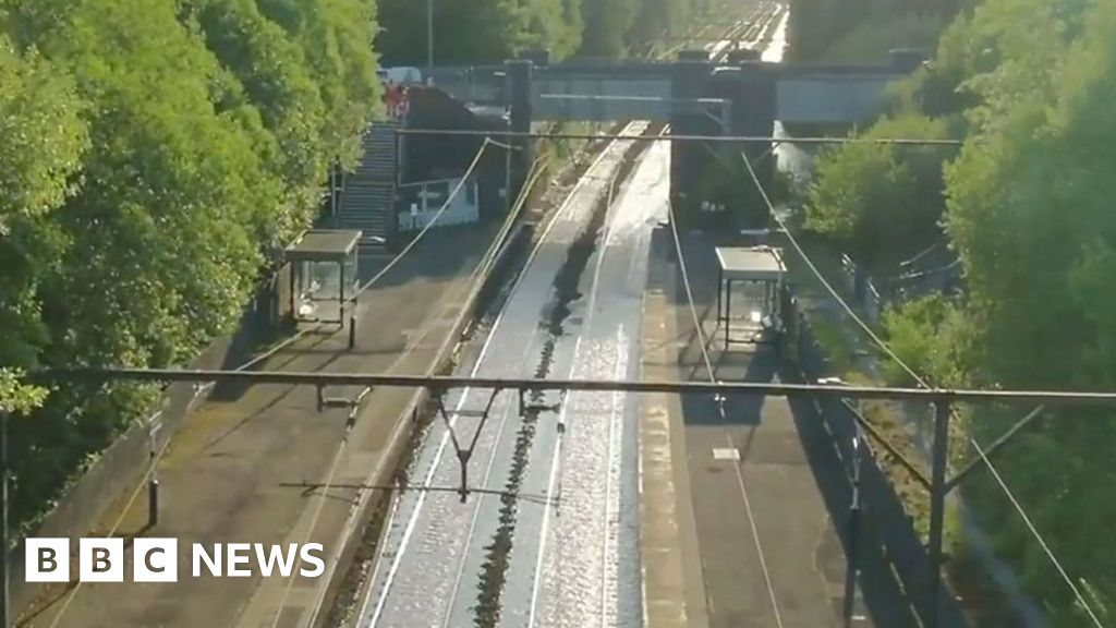 Drone footage shows extent of railway flooding in Audenshaw - BBC News