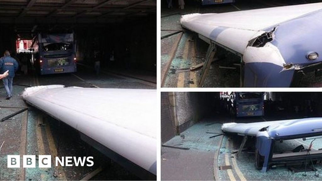 Rochdale bus crash: Three hurt as roof shears off - BBC News