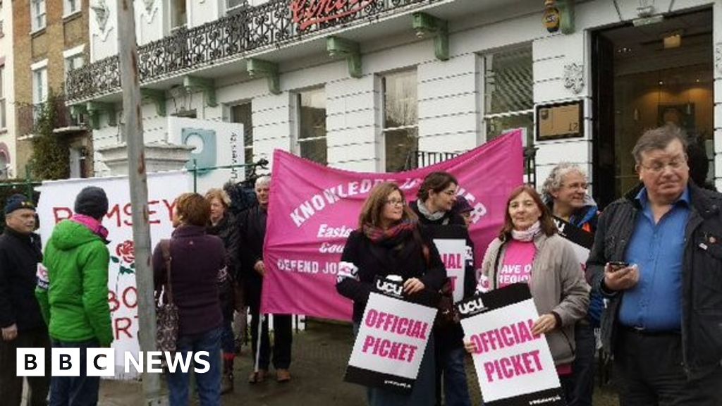 Open University staff strike as centre closures agreed - BBC News