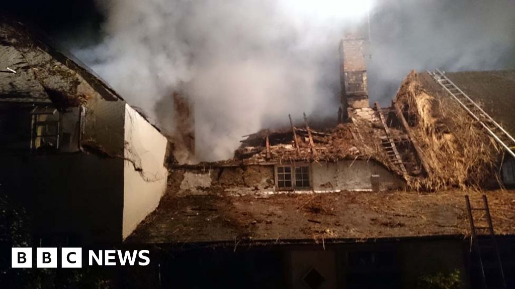 Wood burning stove fire warning over thatched roofs - BBC News