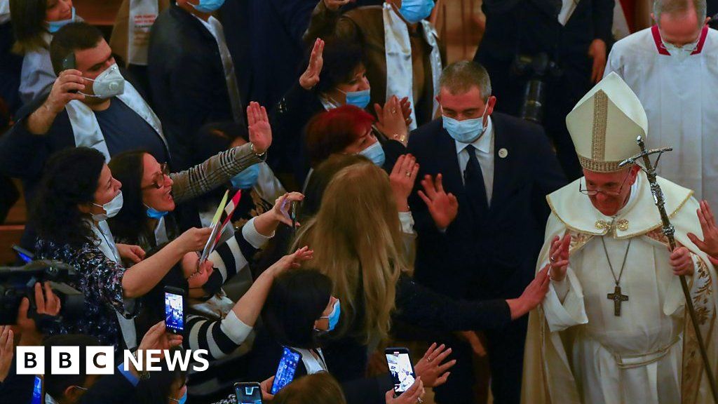 Pope Francis holds first mass in Iraq - BBC News
