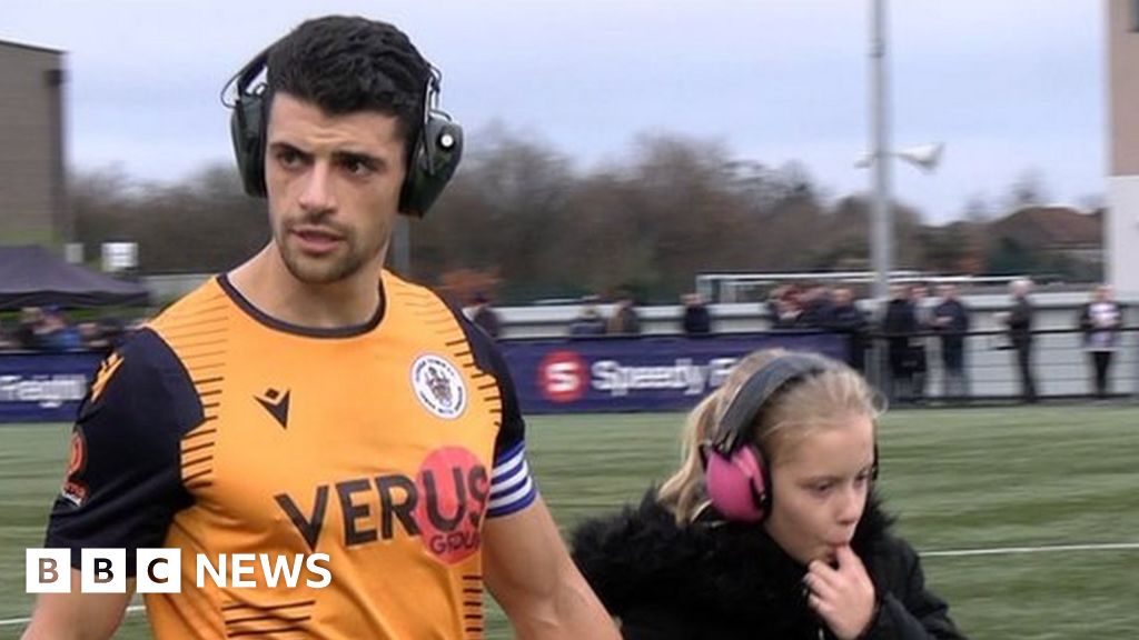 Mascot with autism gets support from Slough Town Football club - BBC News