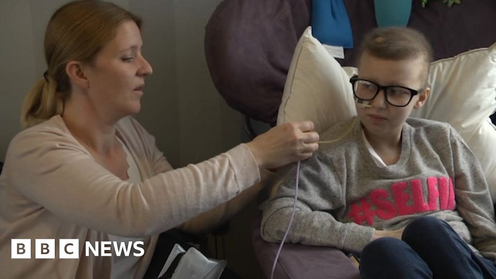 Brain tumour girl raises £35,000 for new research - BBC News