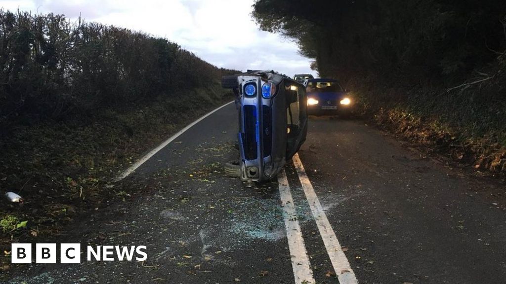 Sports car on its side after A487 crash in Ceredigion