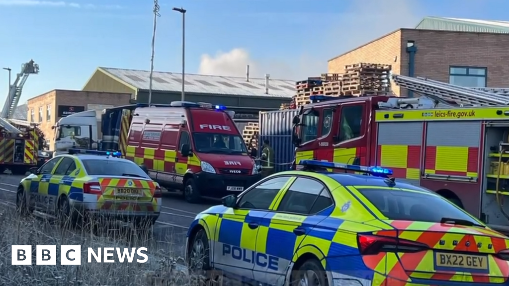 Multiple crews tackle fire at Leicester industrial site - BBC News