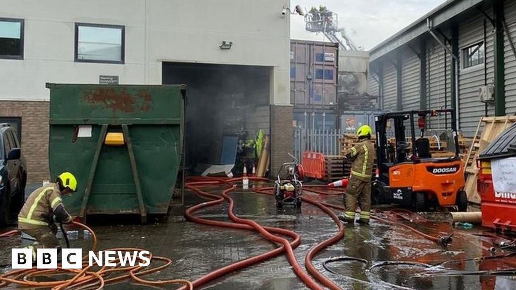 Witham industrial building blaze put out by 12 fire crews - BBC News
