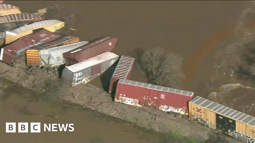 California train accident: Freight cars plunge into water - BBC News