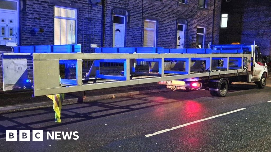 Elland: Police stop van carrying load twice as long as vehicle - BBC News