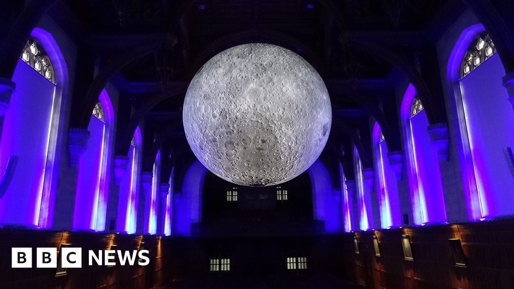 Giant moon hung at University of Bristol hall - BBC News