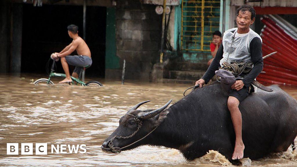 Philippines deadly storm and landslides kill more than 60 - BBC News