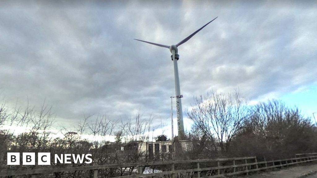 Swaffham Green Britain Centre with giant wind turbine closes