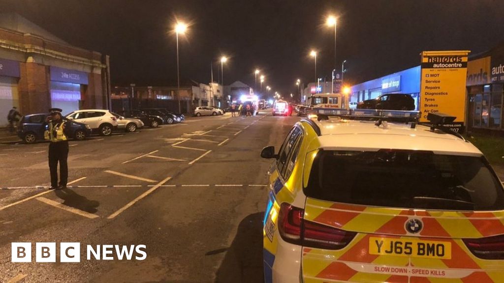 Two people hit by unmarked armed police car in Leeds - BBC News