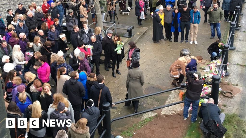 Missing Sally Allan: Family lay flowers at Quayside - BBC News