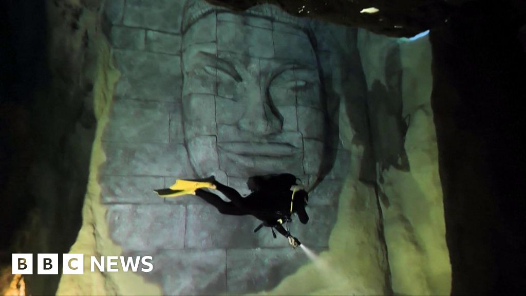 The world's deepest diving pool in Poland - BBC News