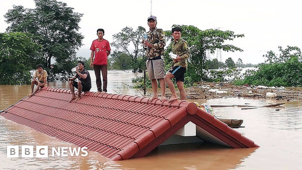 Laos dam collapse: Villagers stranded on rooftops - BBC News