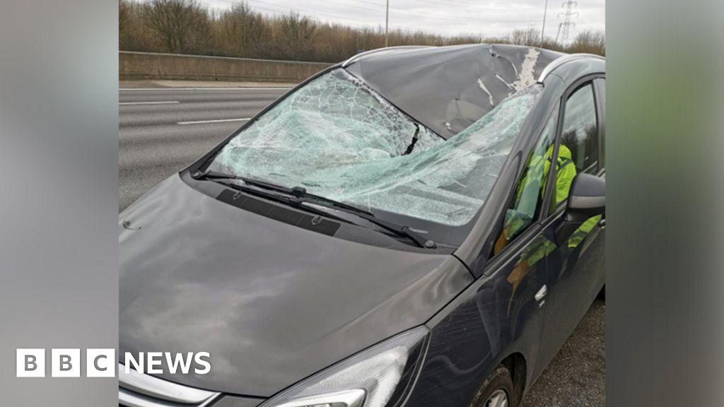 M25: Runaway van wheel 'embedded' in car closes motorway
