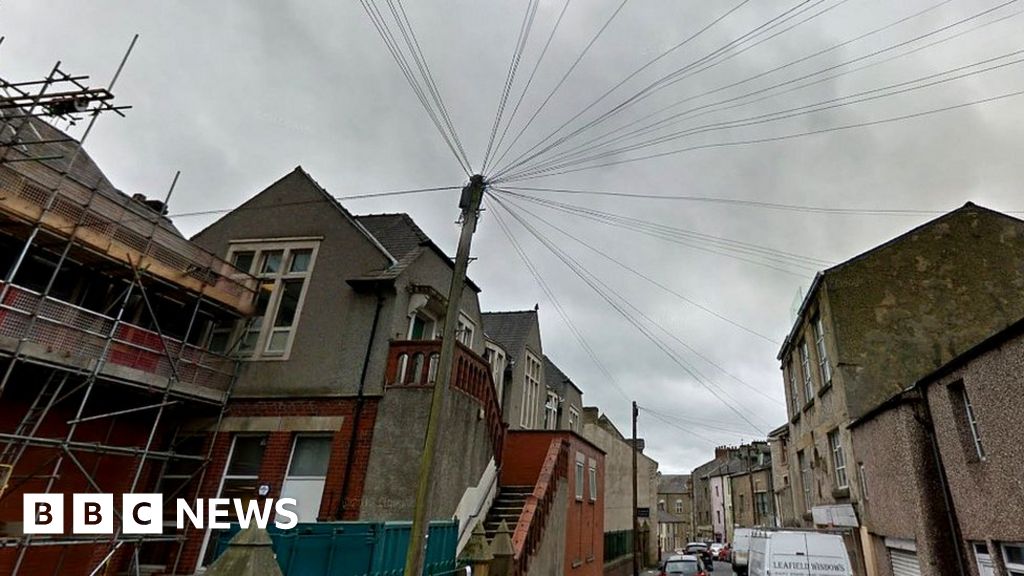 Four people held over gun offences after Chorley raid