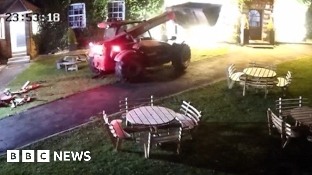 Watch: CCTV shows digger repeatedly ram restaurant