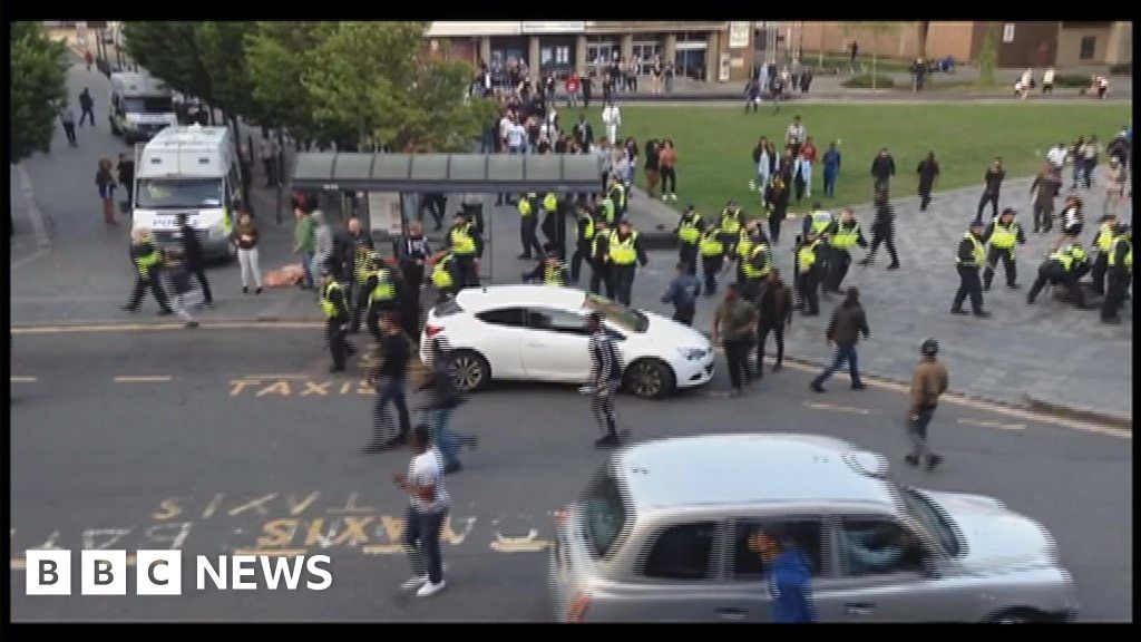 Luton town centre disorder caught on camera - BBC News