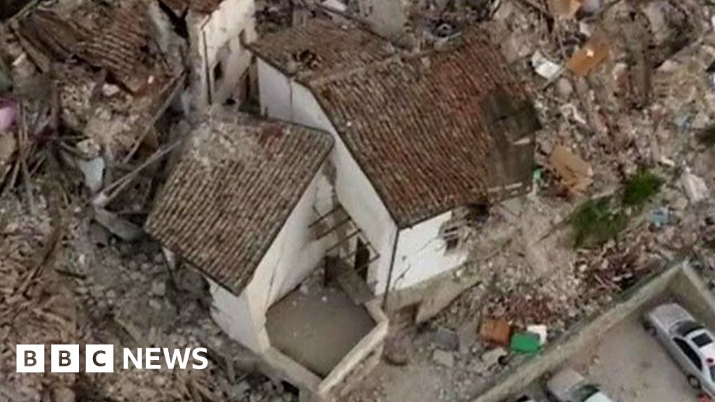 Drone shows extent of Italy quake destruction - BBC News