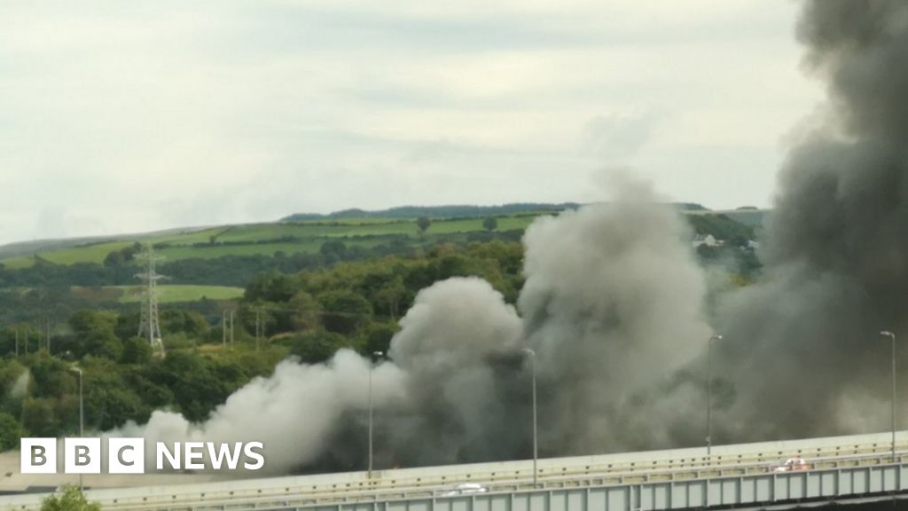 Briton Ferry fire: Four crews called to tyre blaze - BBC News
