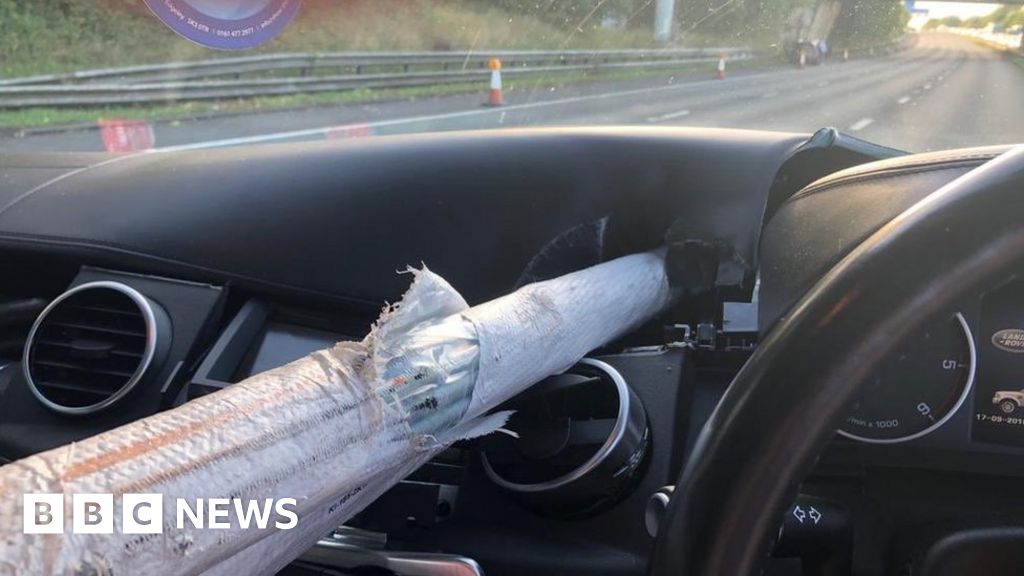 Driver 'lucky' to survive crash after metal poles 'flew' into his car