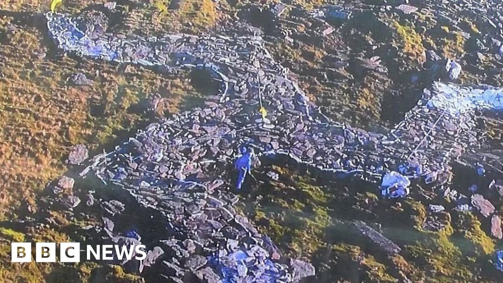 Row over Manx mountain sculpture