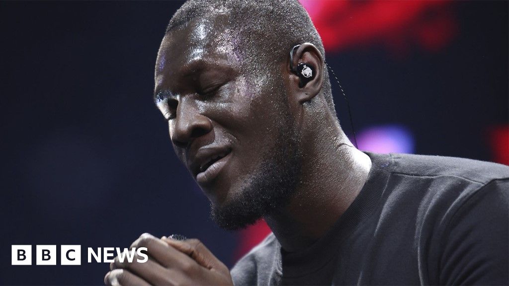 Stormzy sings at fan's father's funeral - BBC News