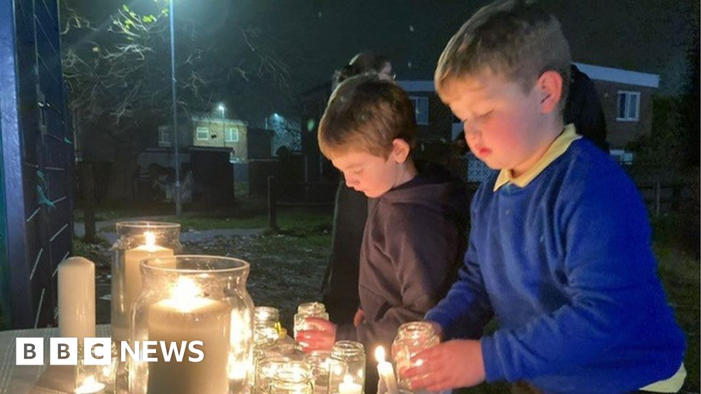 Bridgend: Candlelit vigil held after babies' bodies found - BBC News