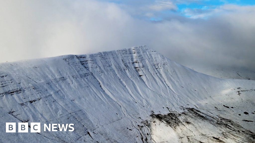 See the snow-topped Brecon Beacons from home during lockdown - BBC News