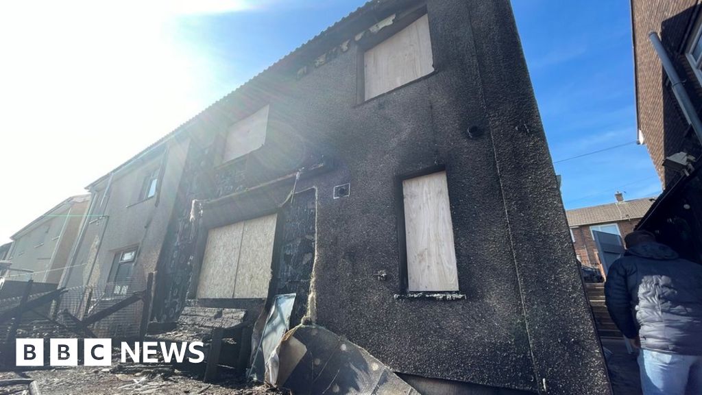 Cimla fire: Couple return from holiday to damaged home - BBC News