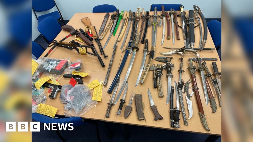 Swords, knives, fake guns and drugs seized at Prestwich house - BBC News