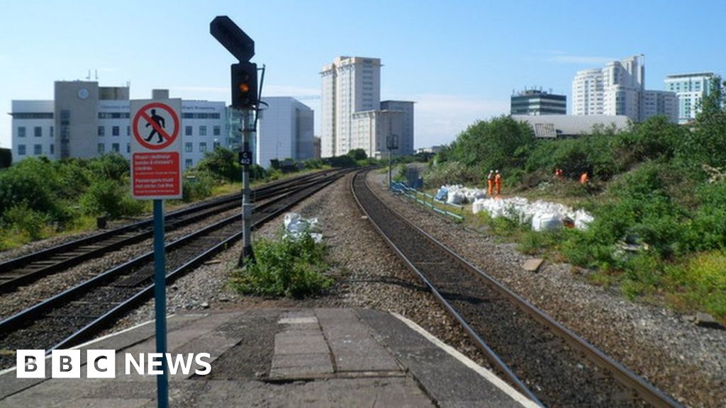 Railway line reopens between main Cardiff stations - BBC News