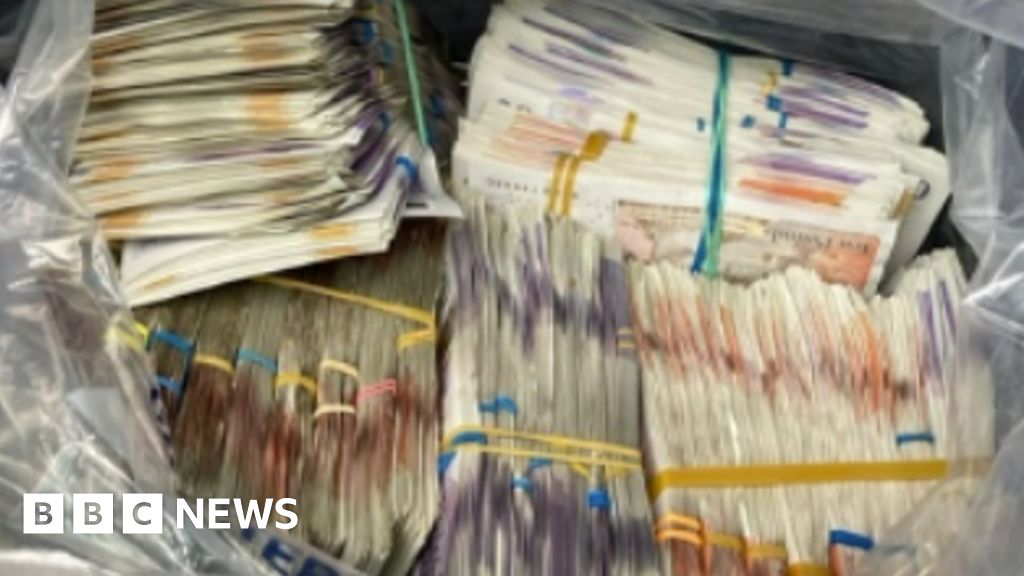 Greater Manchester Police hands criminals' cash to charities - BBC News
