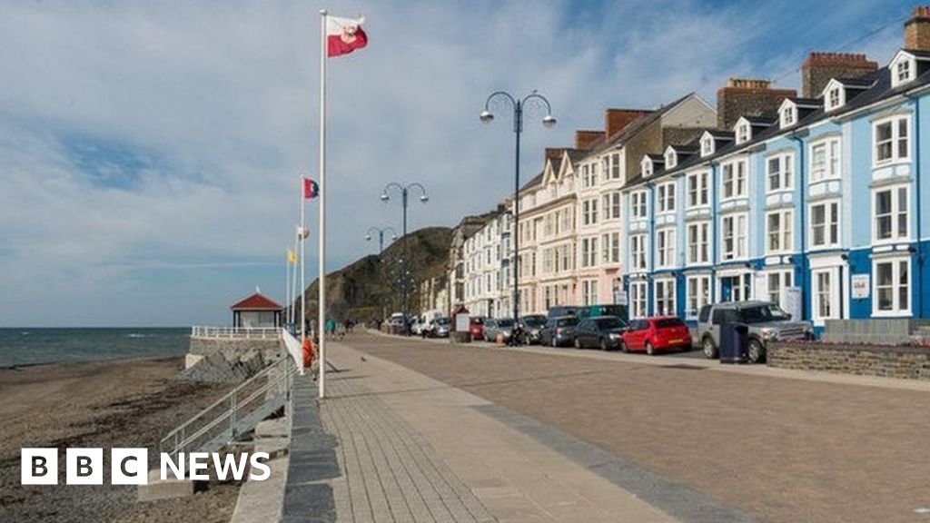 Car 'driven on Aberystwyth pavement': Three summoned to court - BBC News