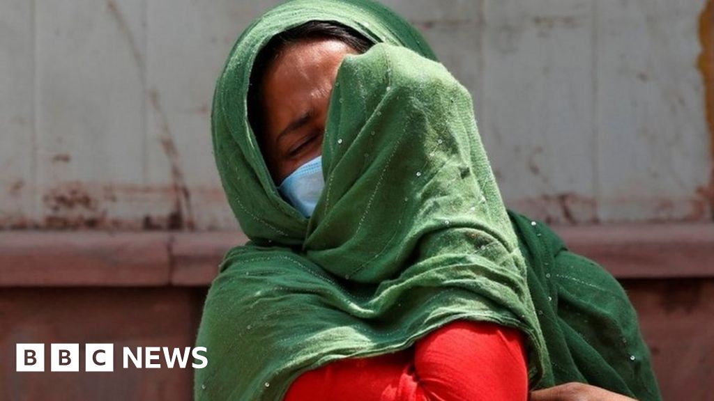 India coronavirus: 'Stay positive' call amid raging pandemic