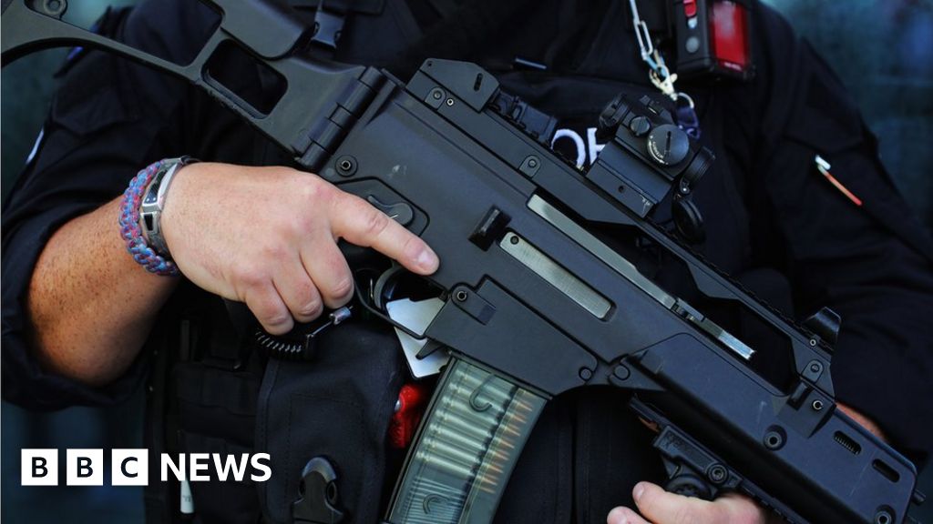 Two girls held for gun offence after Liverpool police raid