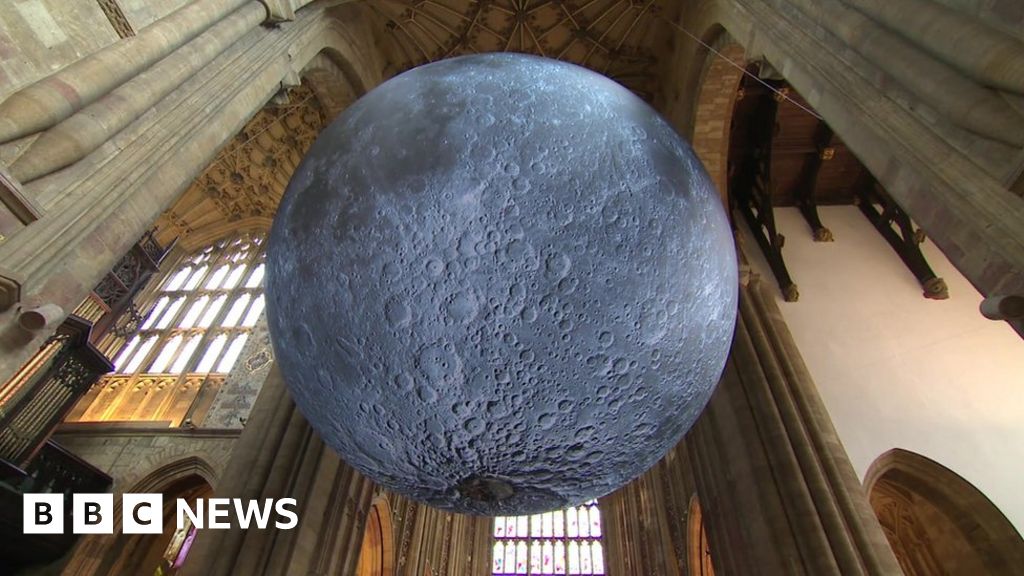 Museum of the Moon sculpture lands at Exeter Cathedral - BBC News