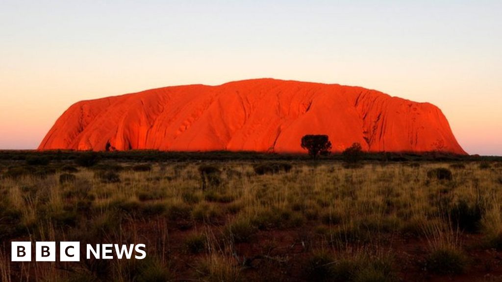 Japanese tourist dies while climbing Uluru in Australia - BBC News