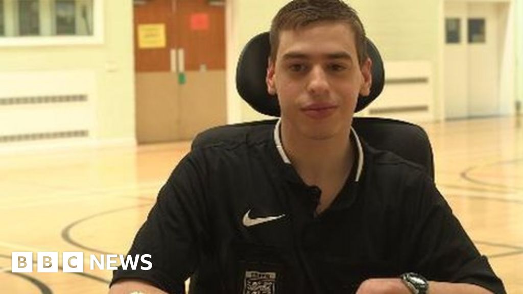 UK's first wheelchair-using referee - BBC News