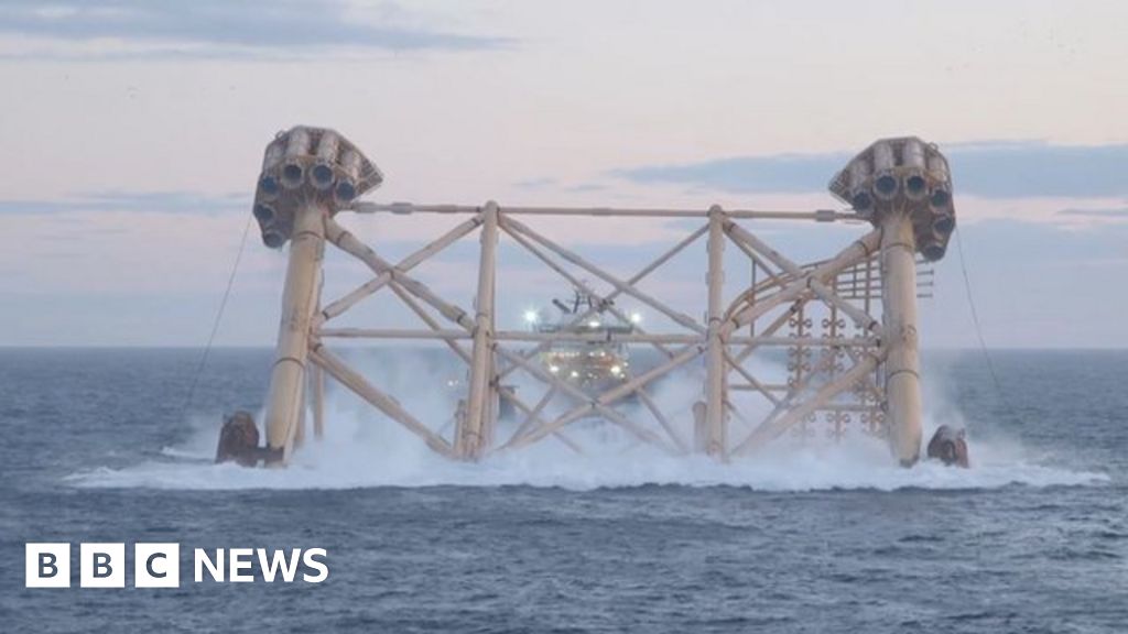 Huge steel jacket lowered into North Sea - BBC News