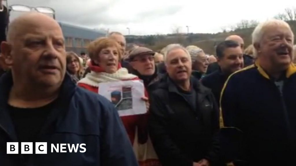 Protesters chant in protest over new recycling boxes - BBC News
